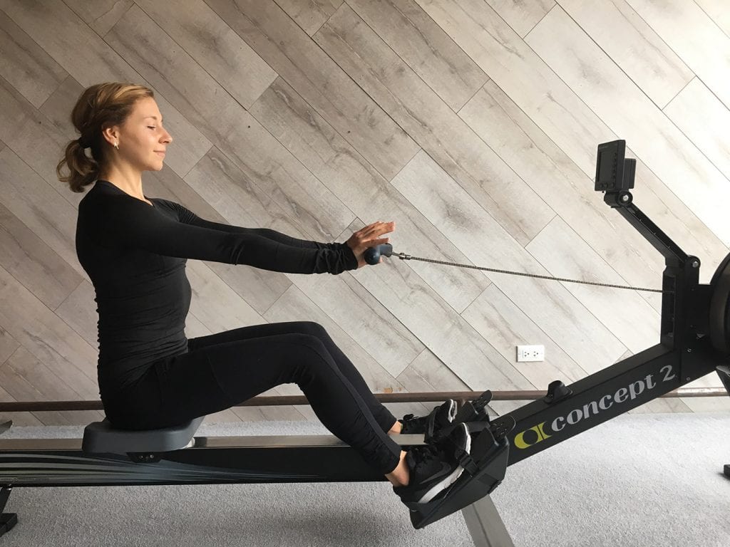 Get in the Zone With This Rowing and Med Ball EMOM Workout - aSweatLife