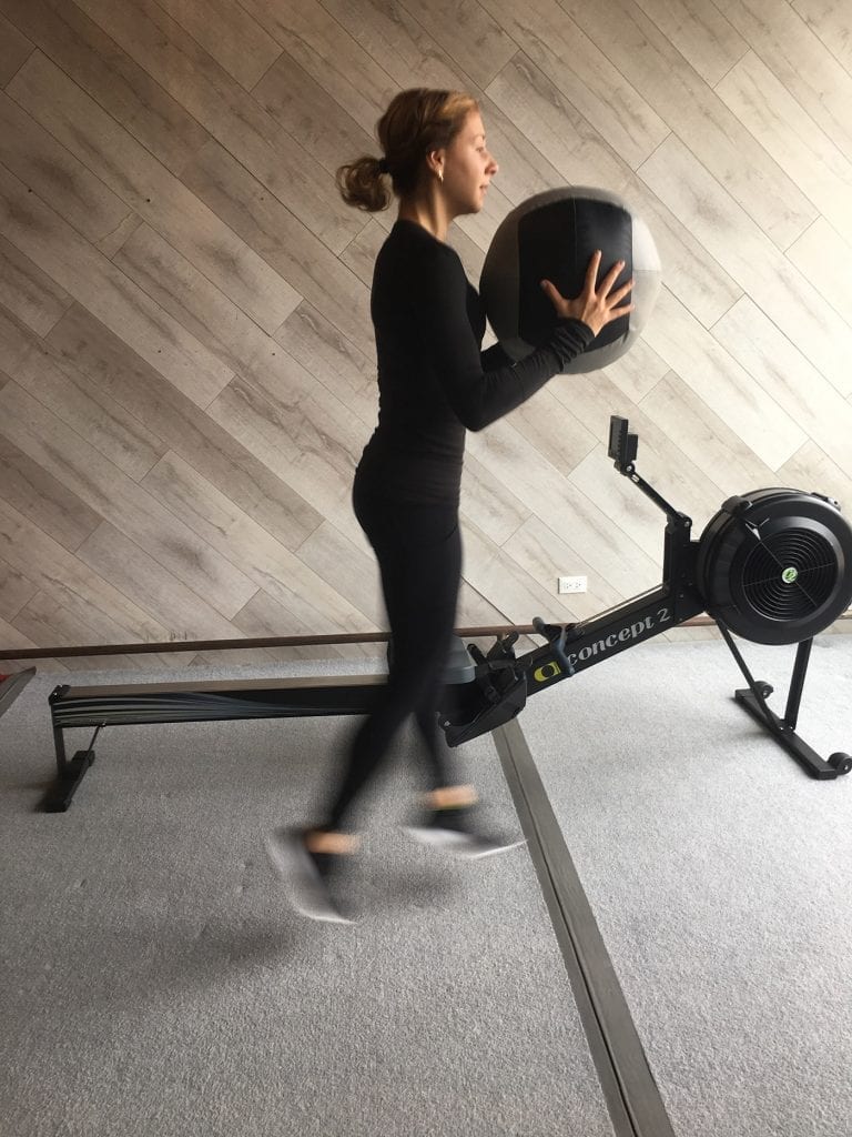 Get in the Zone With This Rowing and Med Ball EMOM Workout - aSweatLife