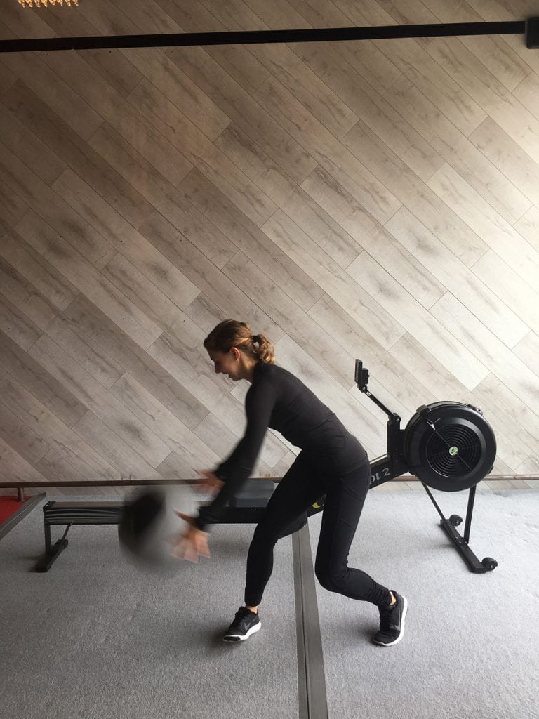 Get in the Zone With This Rowing and Med Ball EMOM Workout - aSweatLife