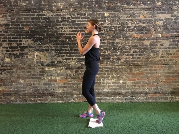 A Pilates Workout With Just Two Towels - aSweatLife